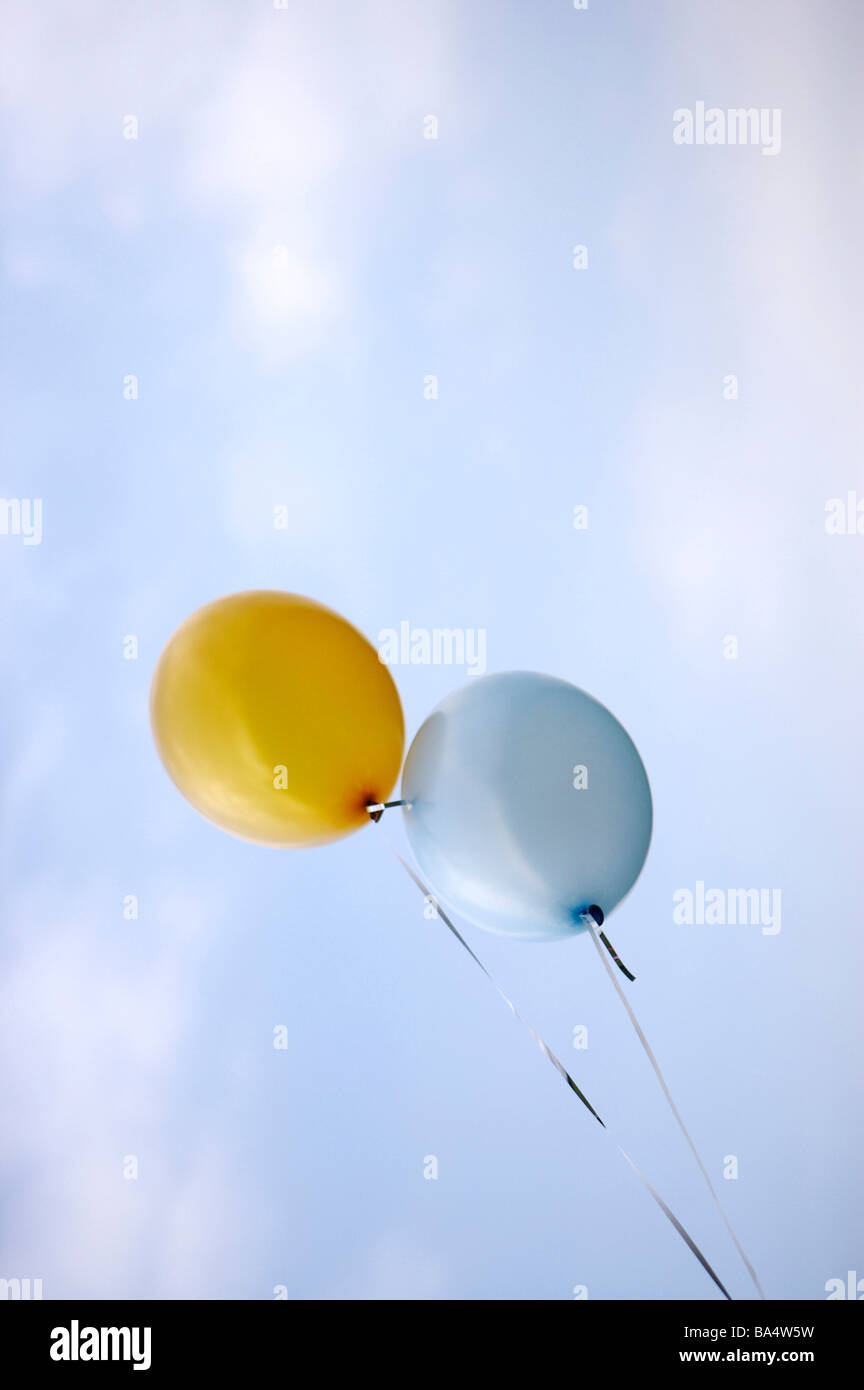 Two balloon in mid air Stock Photo - Alamy