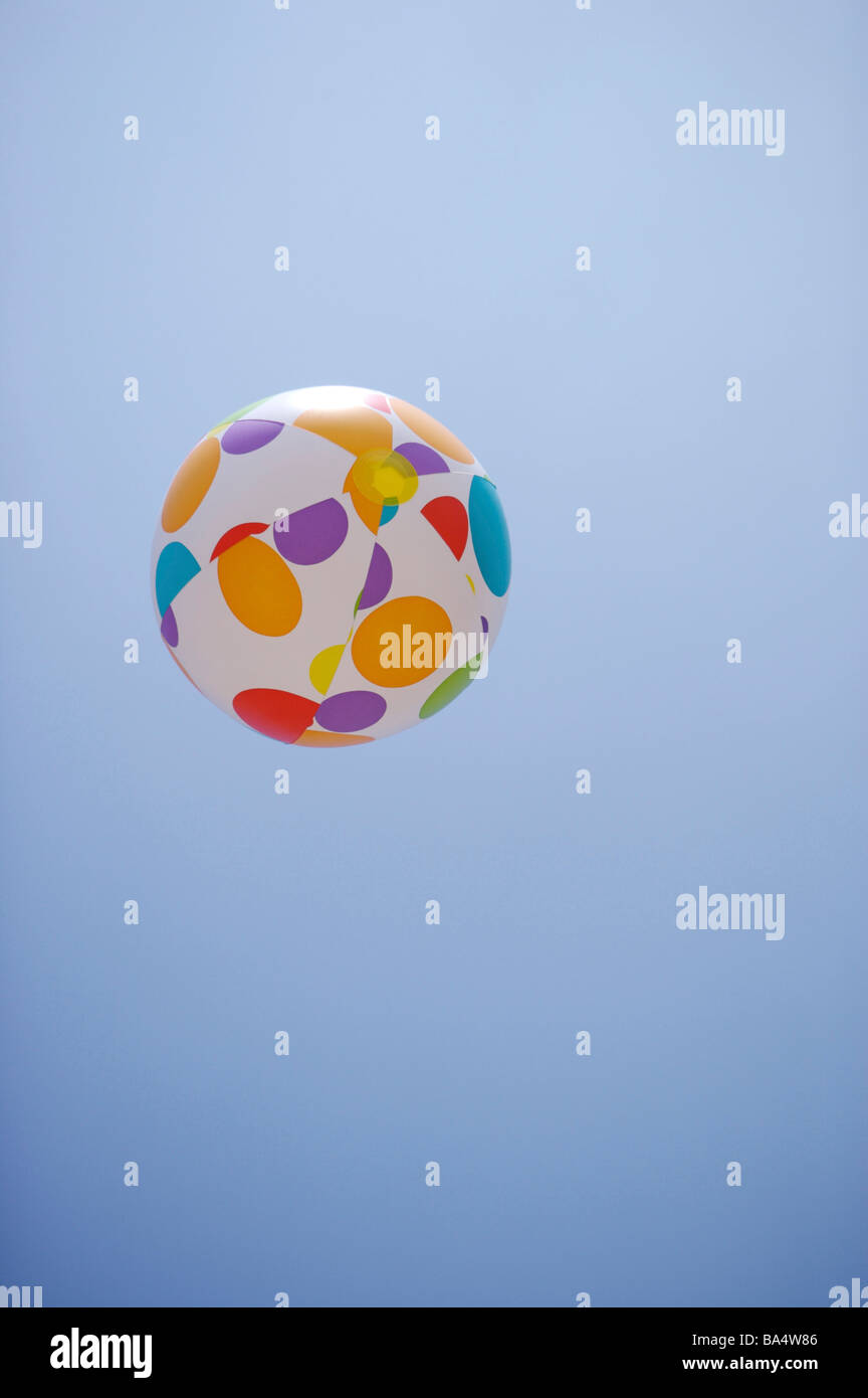 Beach ball in mid air Stock Photo - Alamy