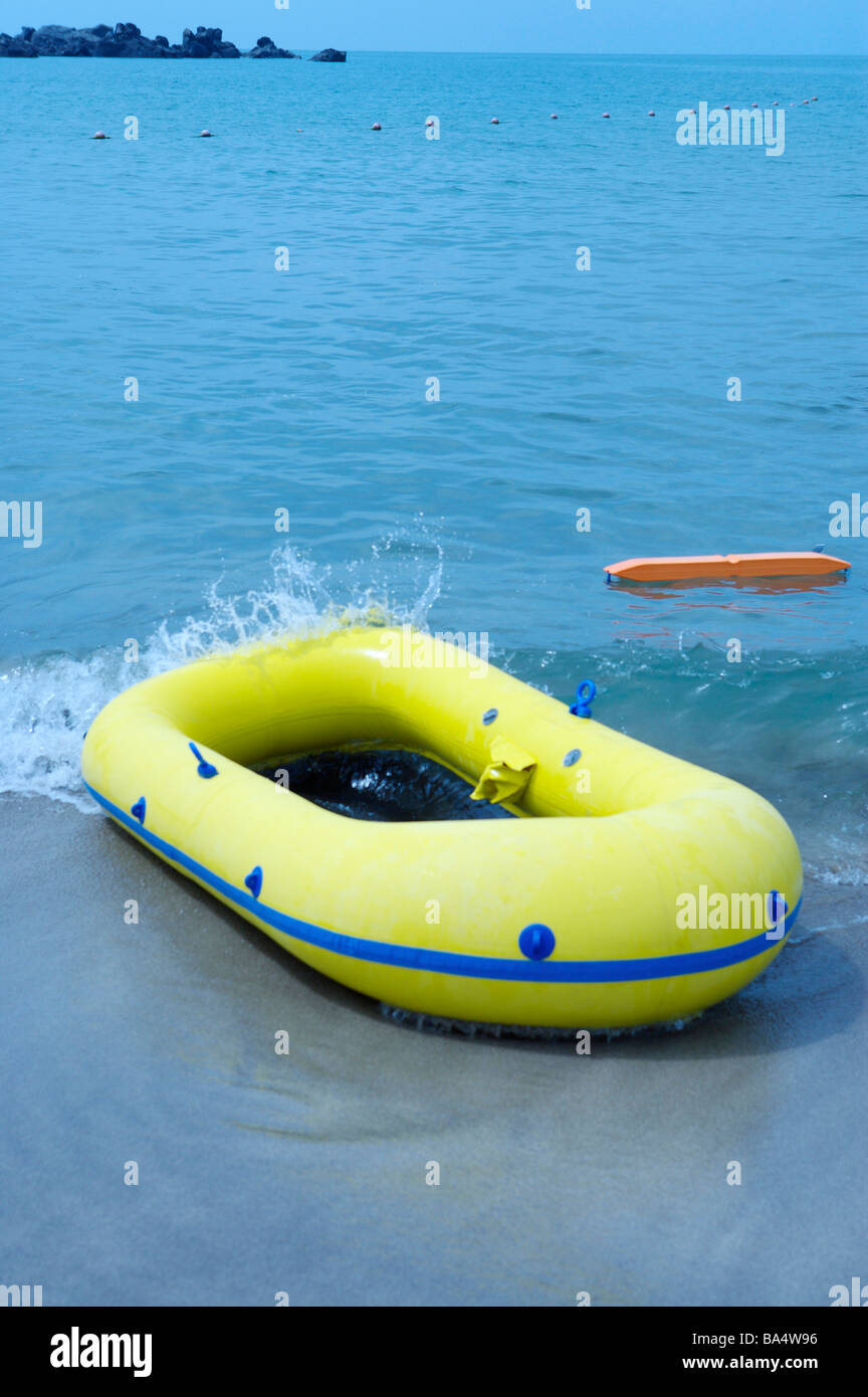 Pool raft at beach Stock Photo - Alamy