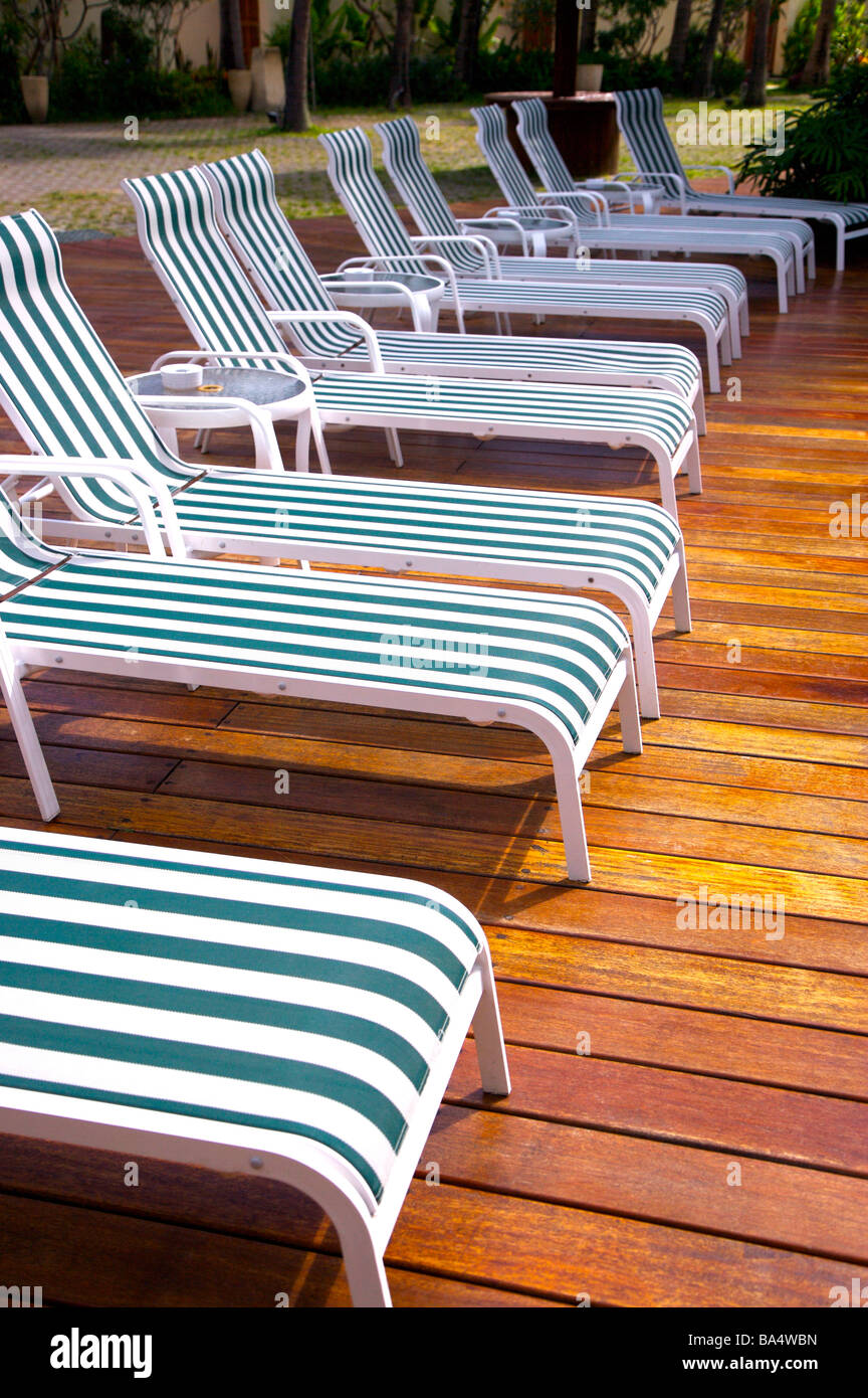 Empty outdoor chairs in a row Stock Photo - Alamy