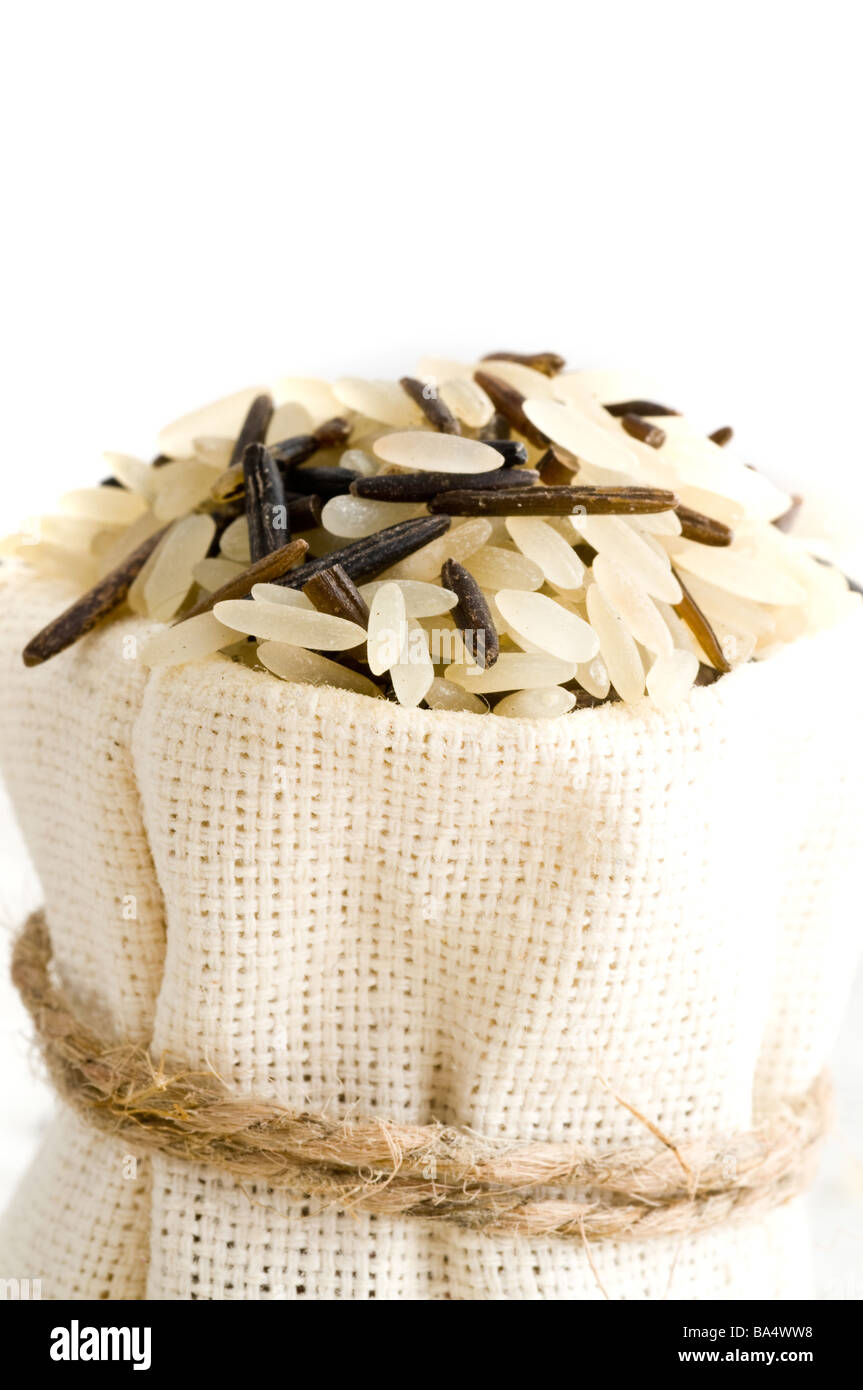 raw Rice in small sack Stock Photo - Alamy