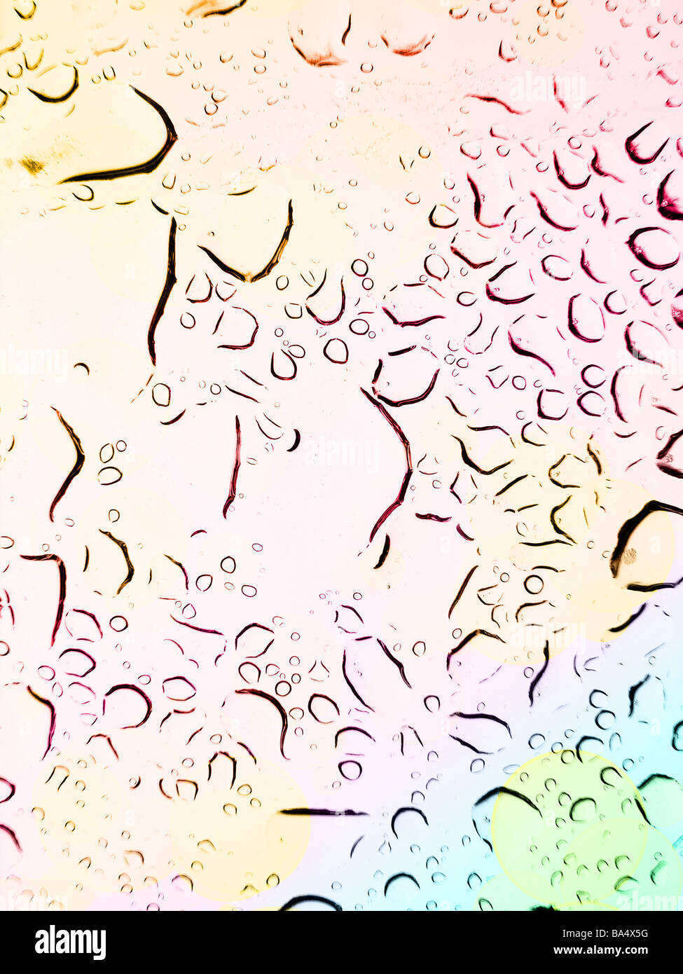 Rain drops on glass color Stock Photo - Alamy