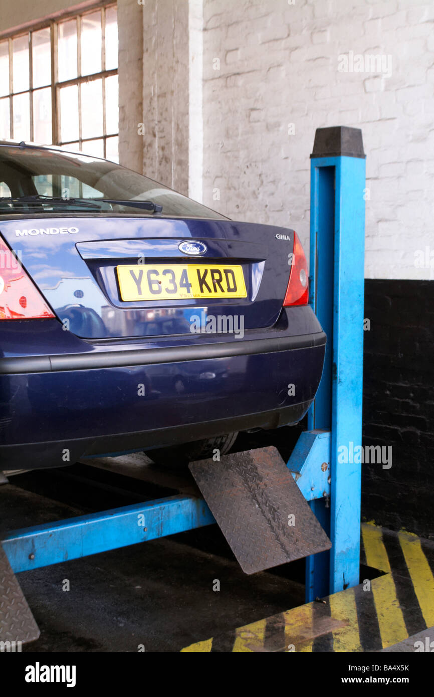 Car being repaired in garage hi-res stock photography and images - Alamy