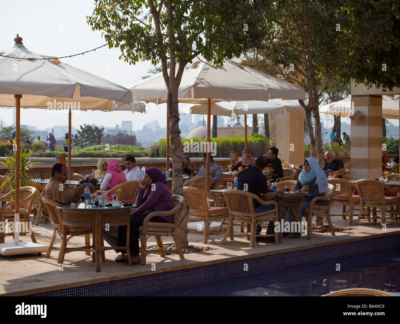 patrons at the lakeside cafe, al-Azhar Park, Cairo, Egypt Stock Photo ...