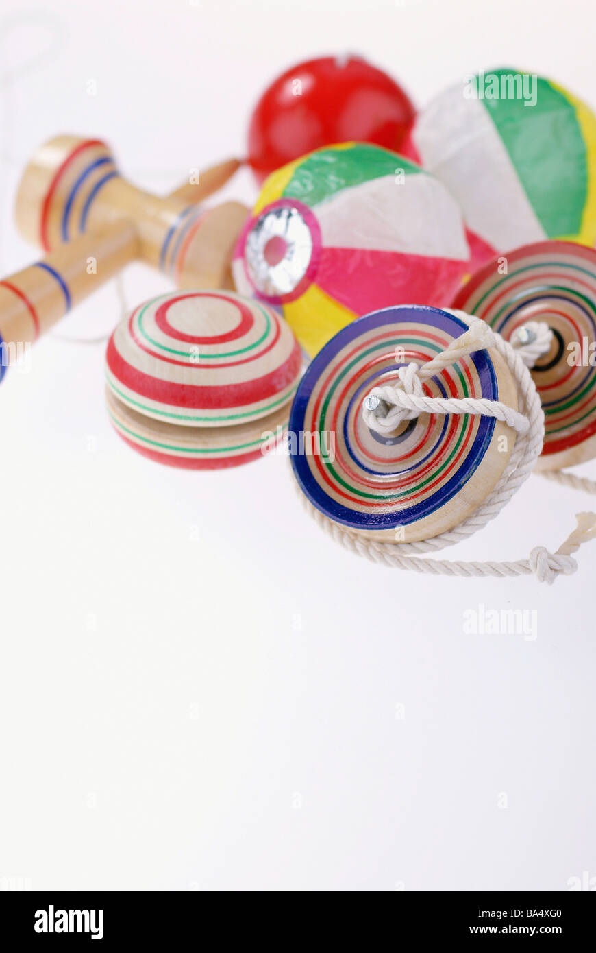 Wooden Yoyo and Kendama, and Paper Balloons Stock Photo - Alamy