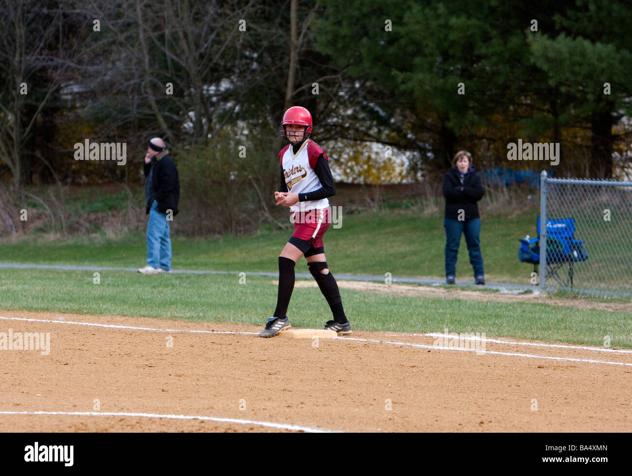 A girls high school softball game Stock Photo - Alamy