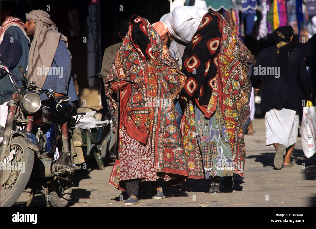 Veiled Yemeni Women Covered in Burquas in the Main Souk or Market of ...