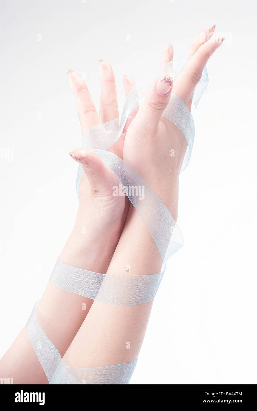 Hands Tied with Ribbon Stock Photo - Alamy