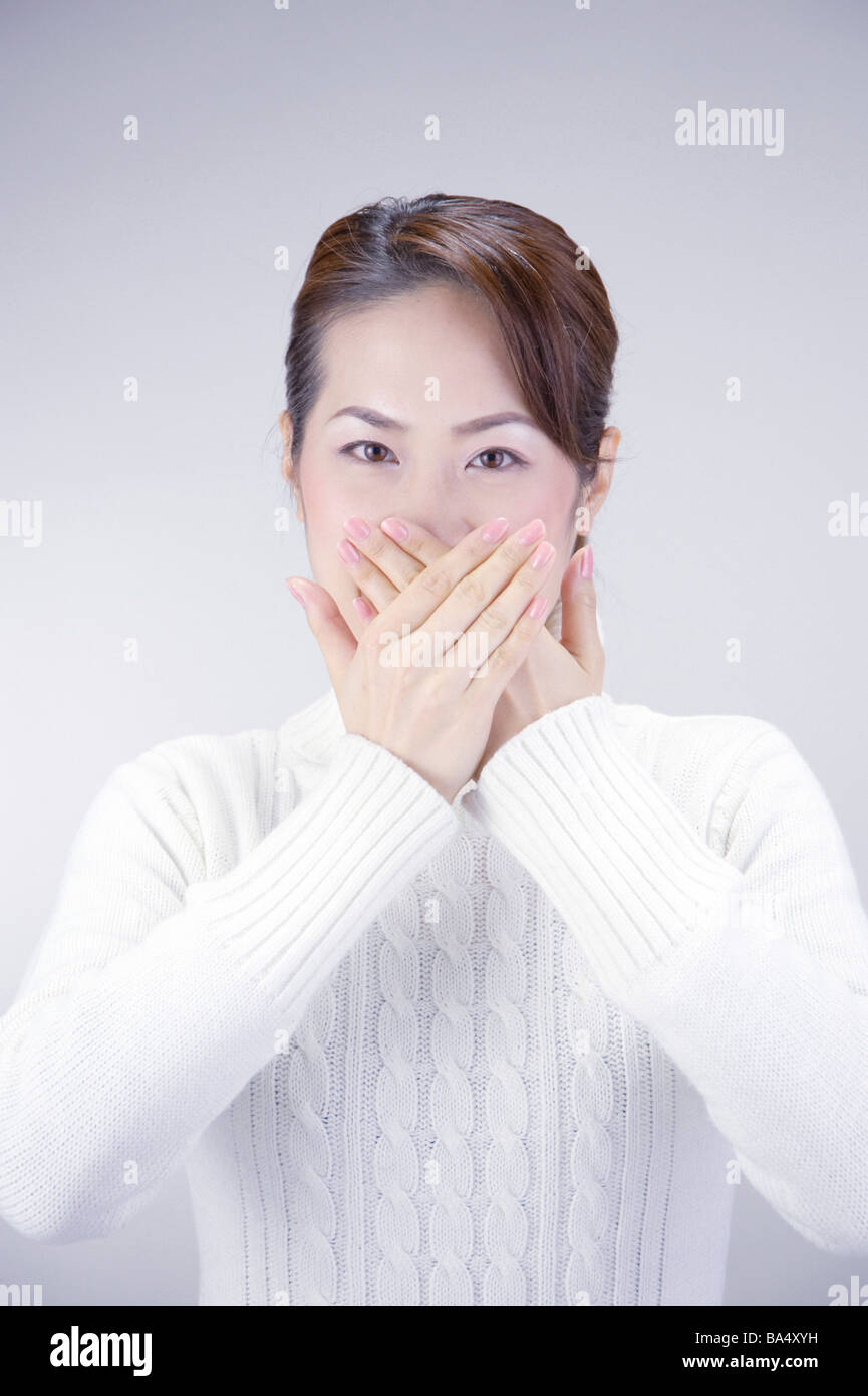 Hands on his lips hi-res stock photography and images - Alamy