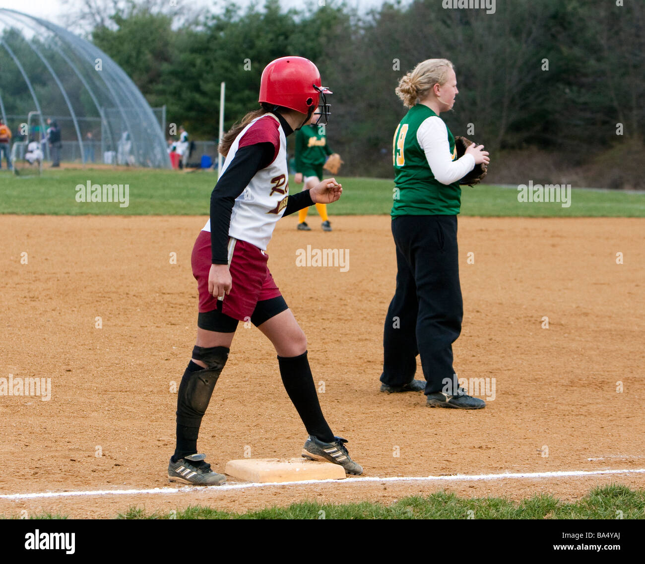 A girls high school softball game Stock Photo - Alamy
