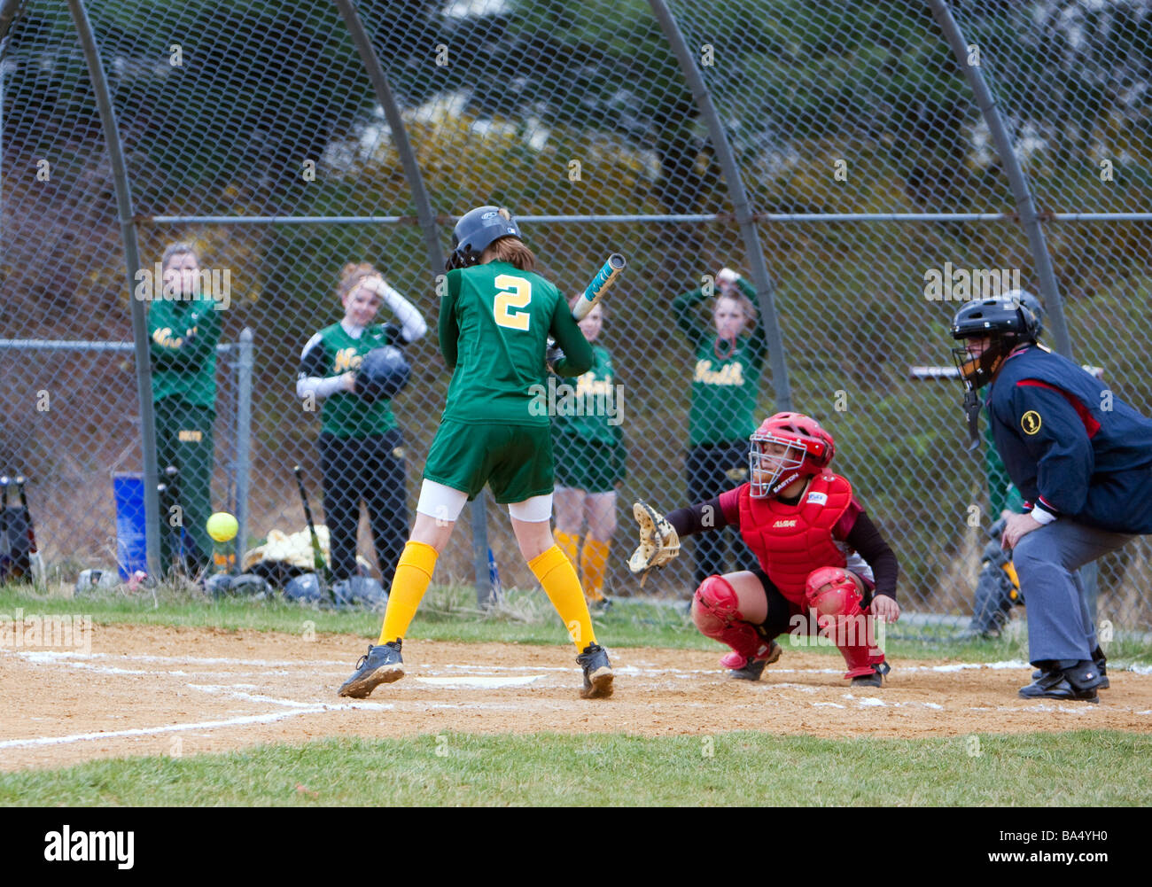 A batter, catcher and umpire at a girls highschool softball game Stock ...