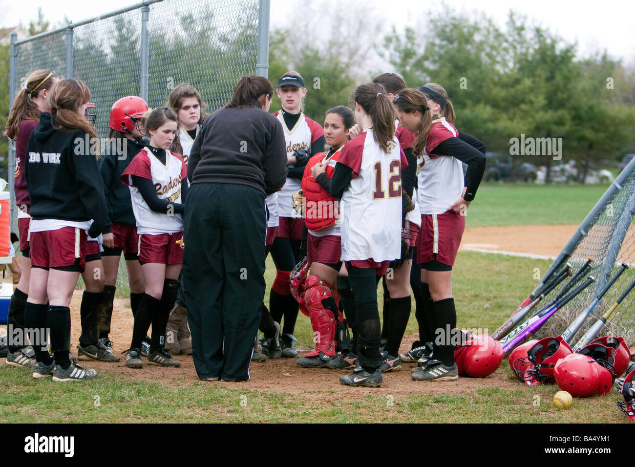 A girls high school softball game Stock Photo - Alamy