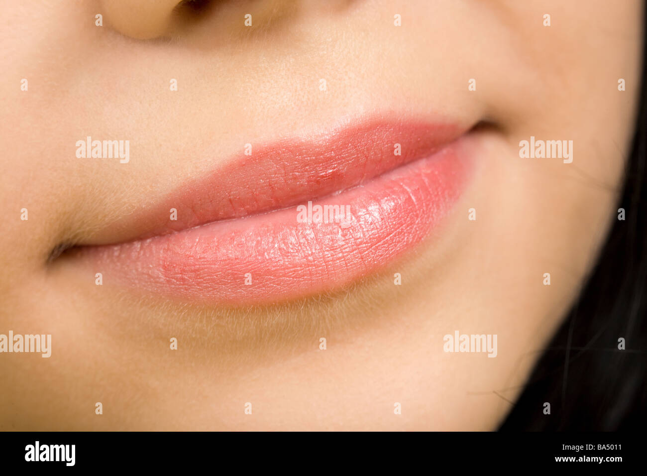 the female lips with cosmetics macro shot Stock Photo - Alamy