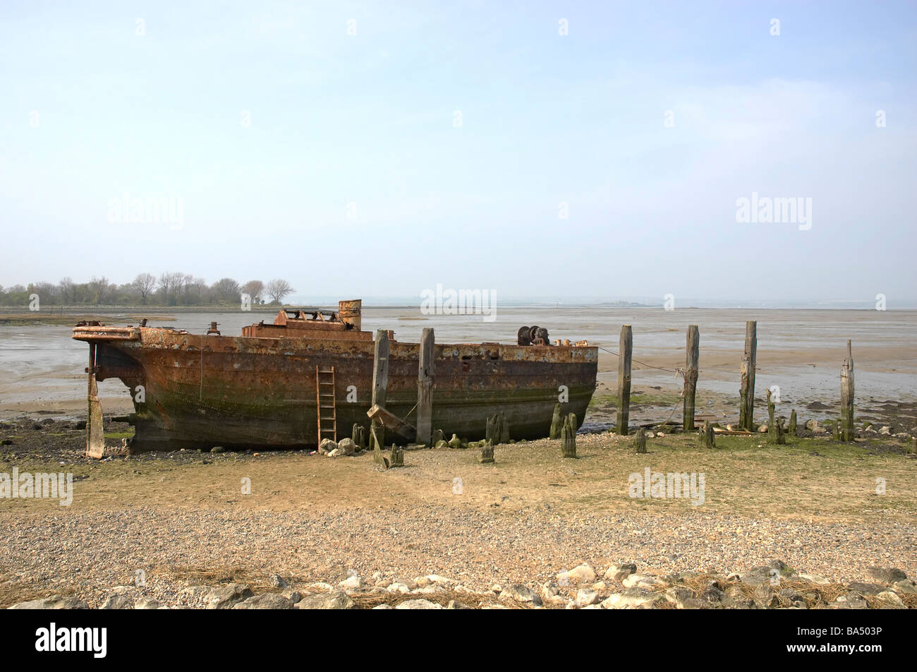 An old abandoned river barge on the river medway in kent England Stock ...