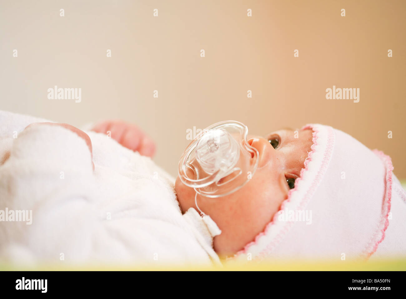 adorable baby with pacifier Stock Photo - Alamy