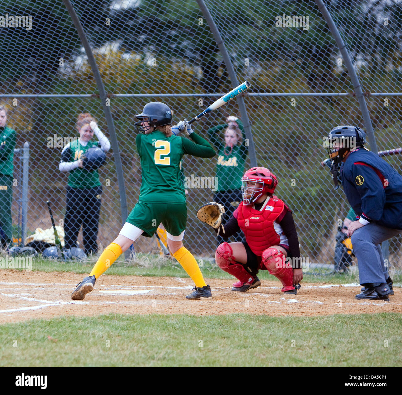 A batter, catcher and umpire at a girls highschool softball game Stock ...