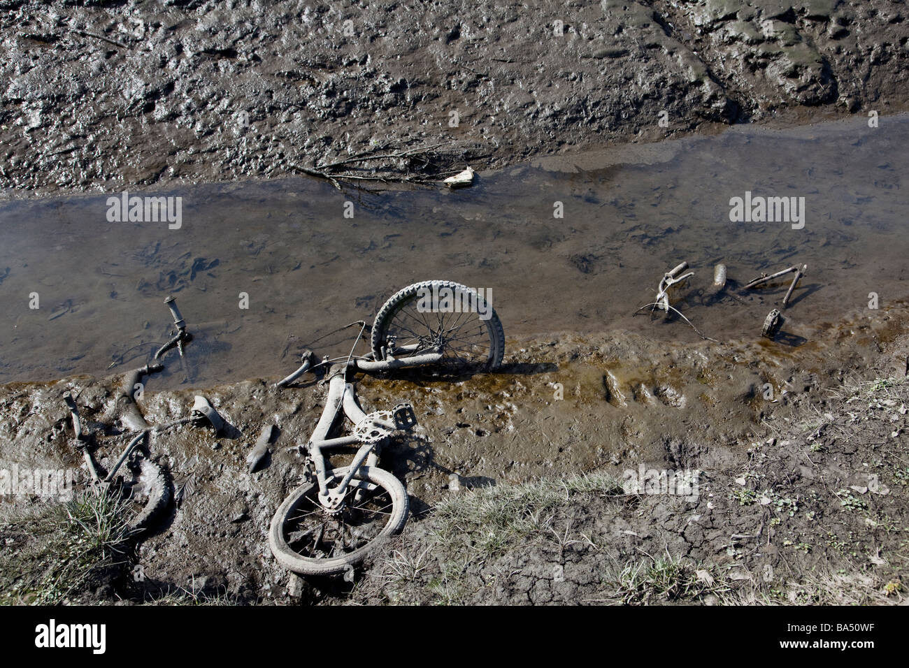 Old bicycle dumped Stock Photo - Alamy