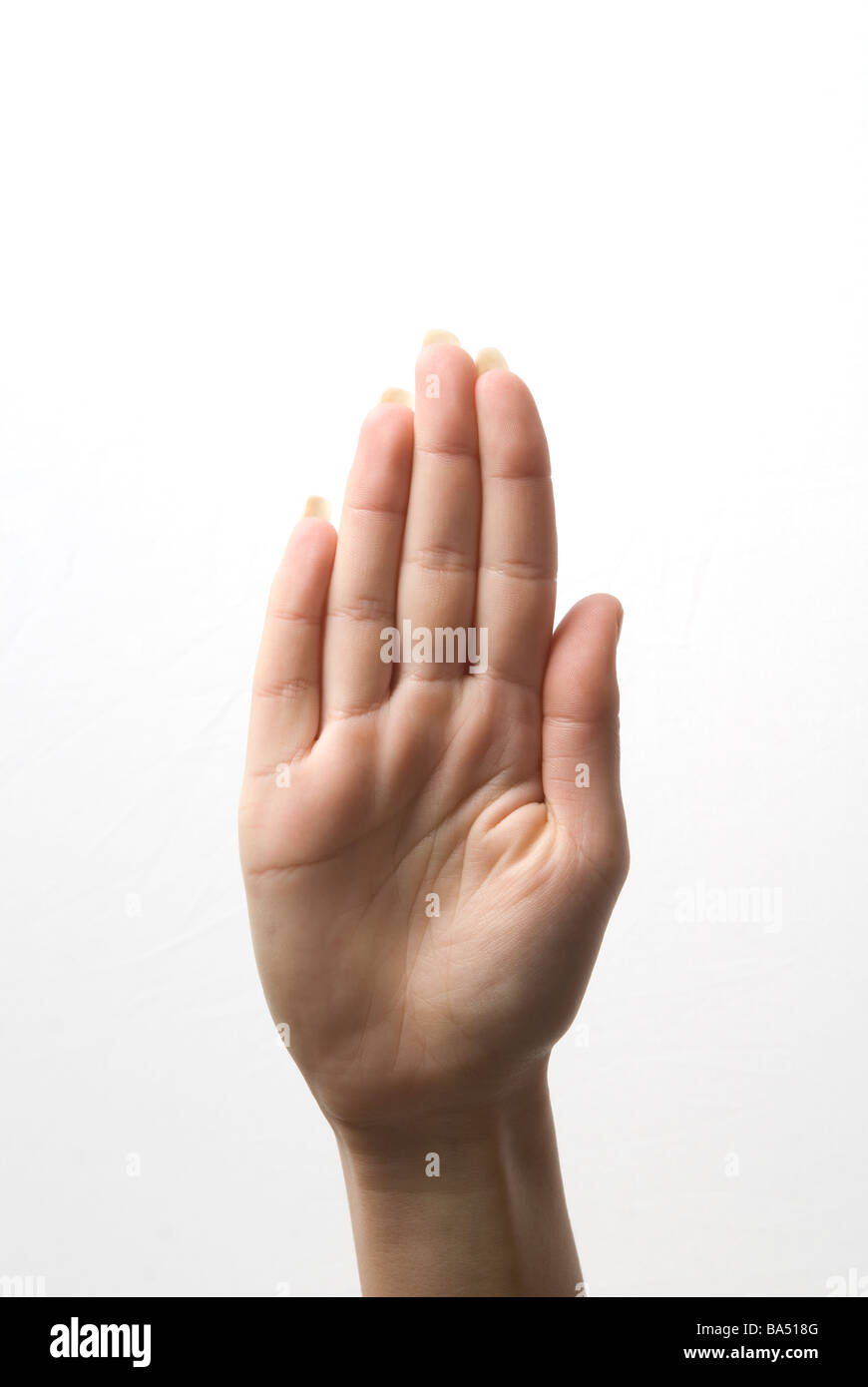 Woman's hand against a white background Stock Photo - Alamy