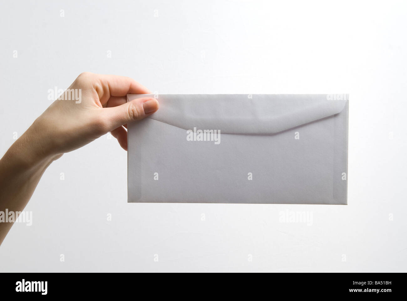 Girl handing envelope hi-res stock photography and images - Alamy
