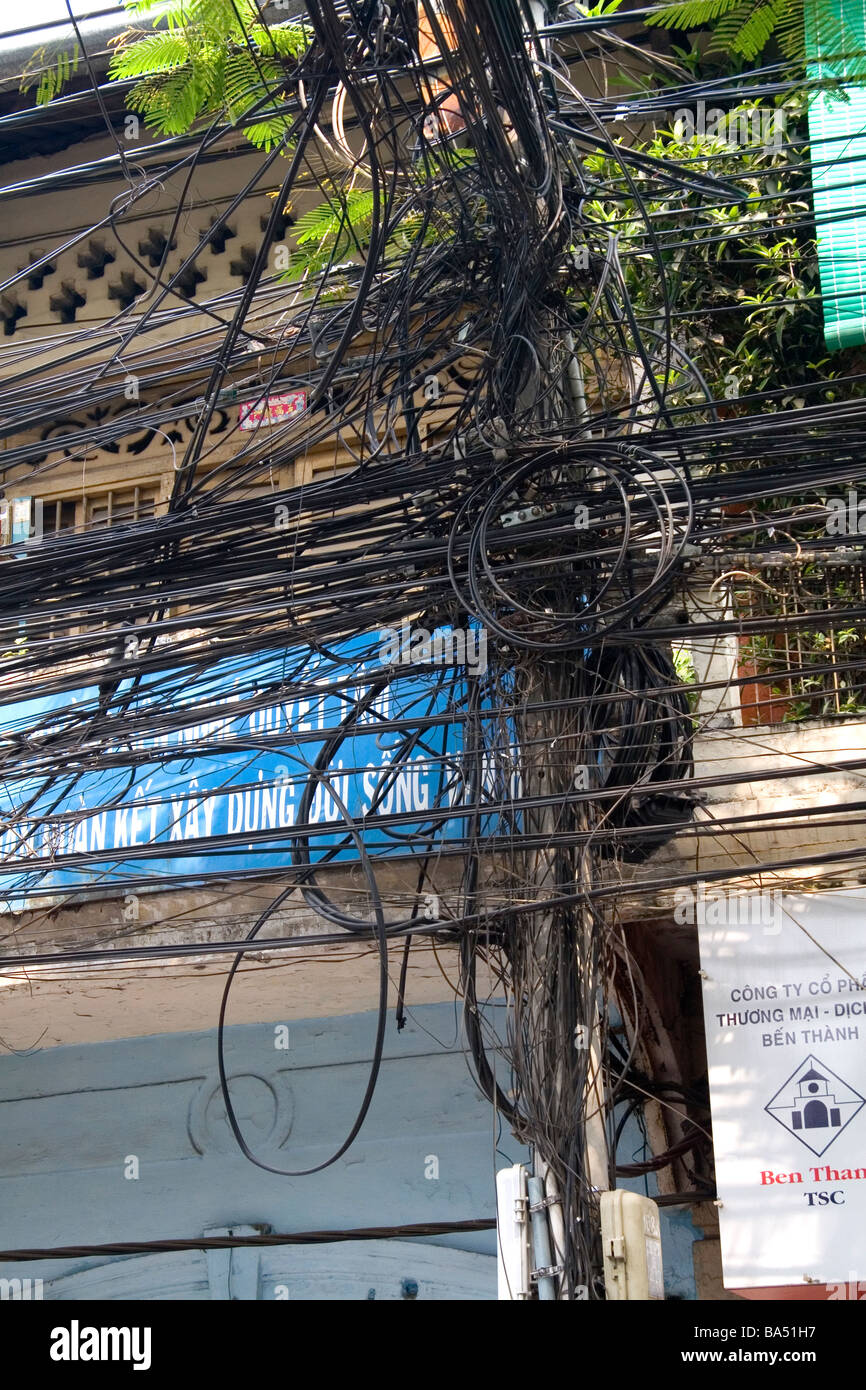 A tangle of telephone wires on a utility pole in Ho Chi Minh City ...
