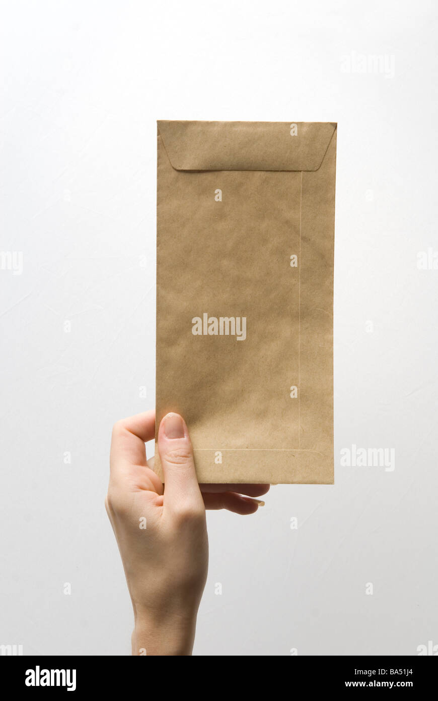 Girl handing envelope hi-res stock photography and images - Alamy