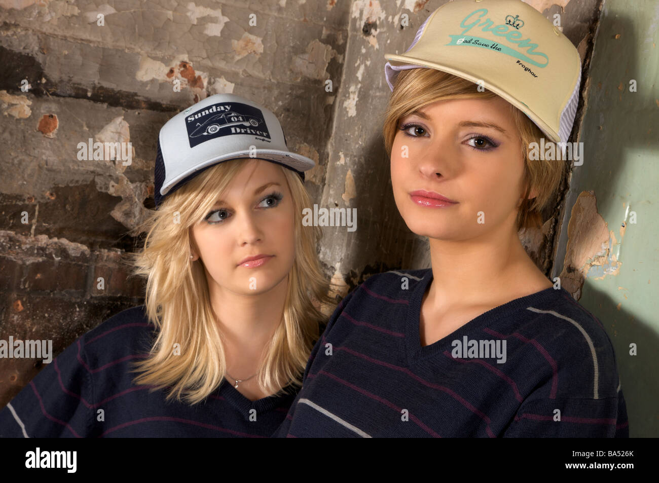 Two Women wearing caps Stock Photo - Alamy