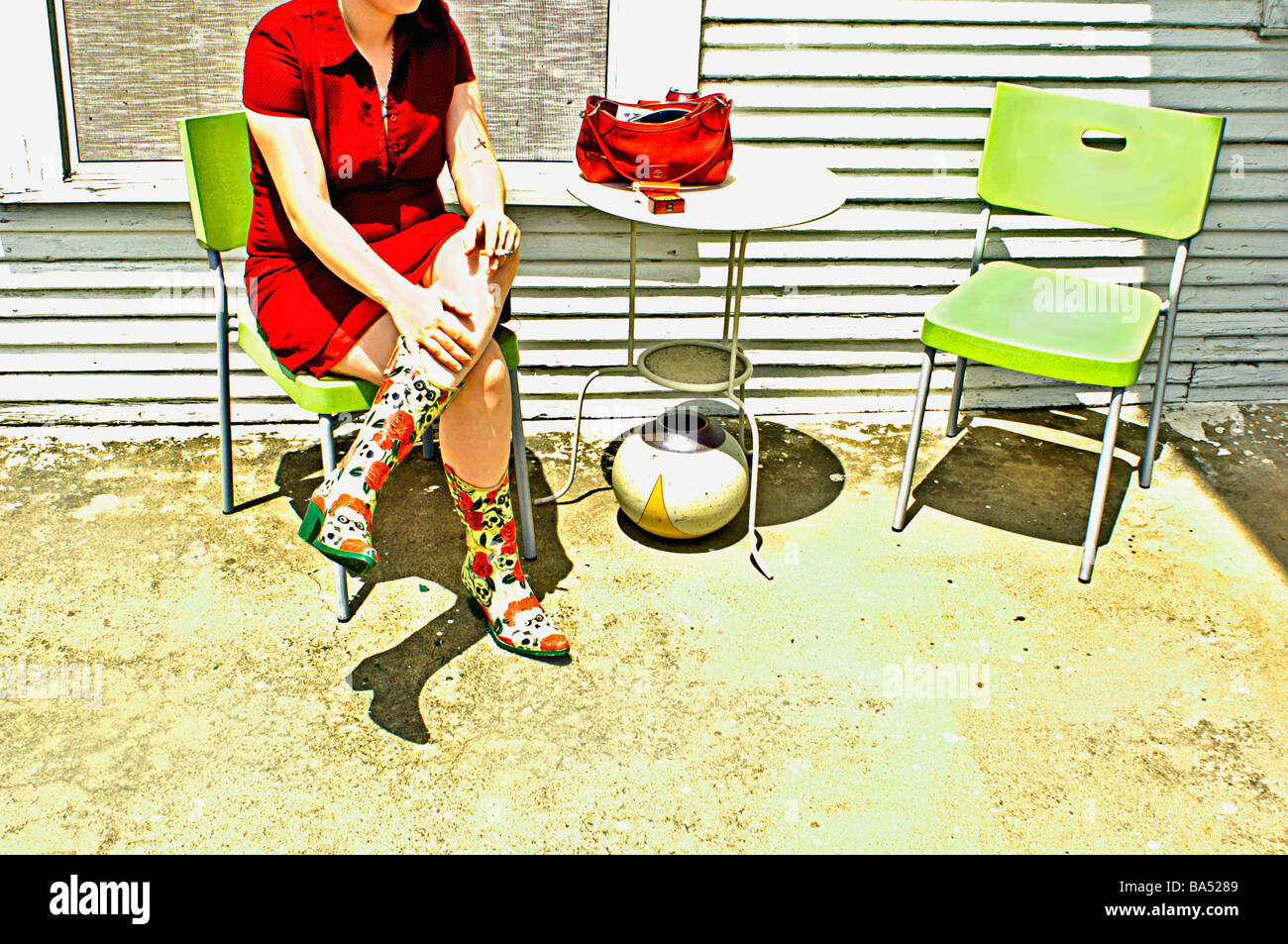 Middle class lady in bright red dress sitting on victorian ...