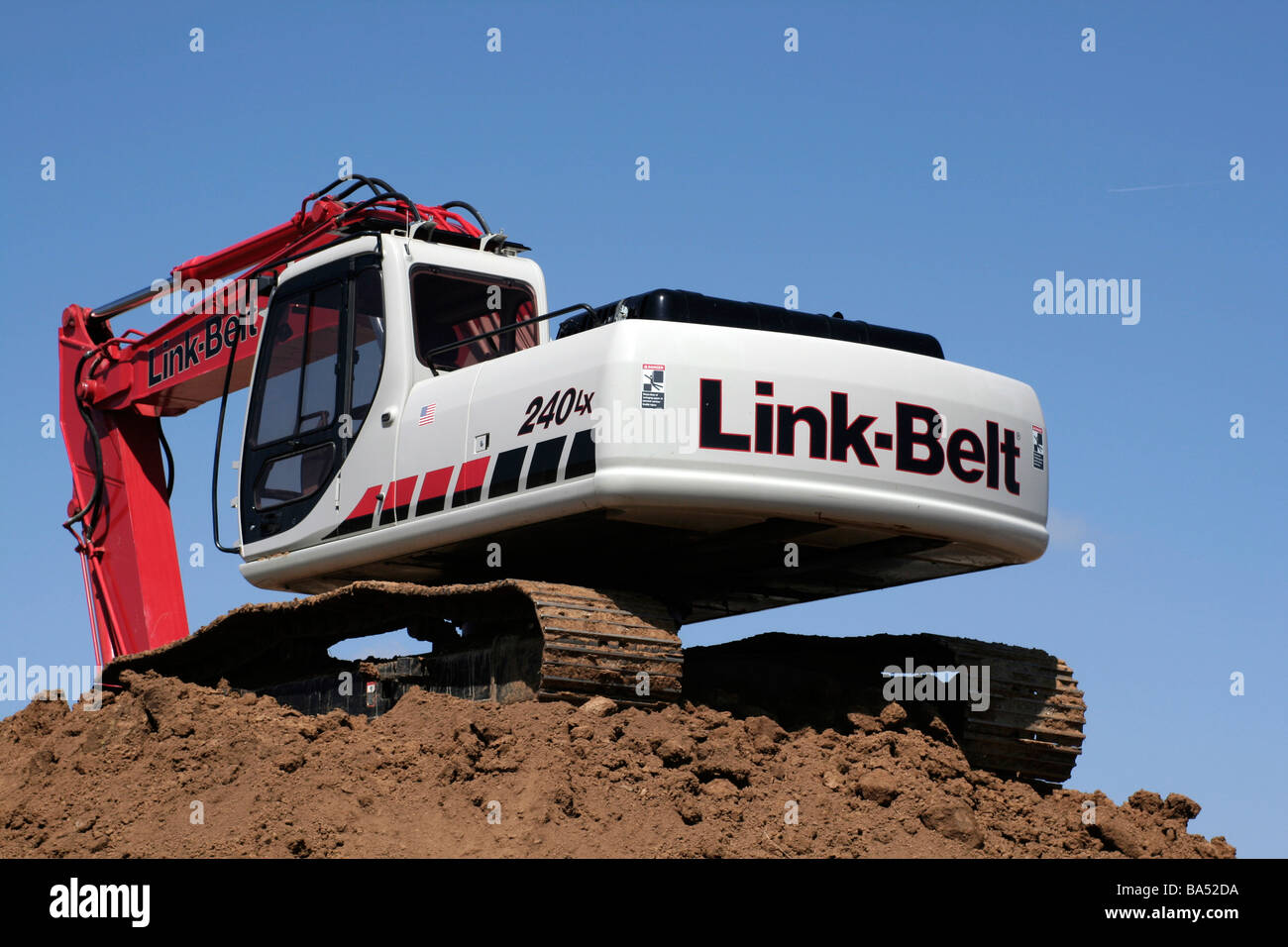 Excavator on construction site Stock Photo - Alamy