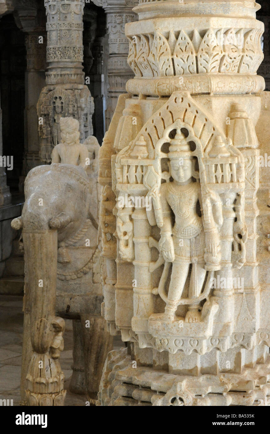 Intricately engraved pillars in the Adinatha Jain Temple at Ranakpur in ...