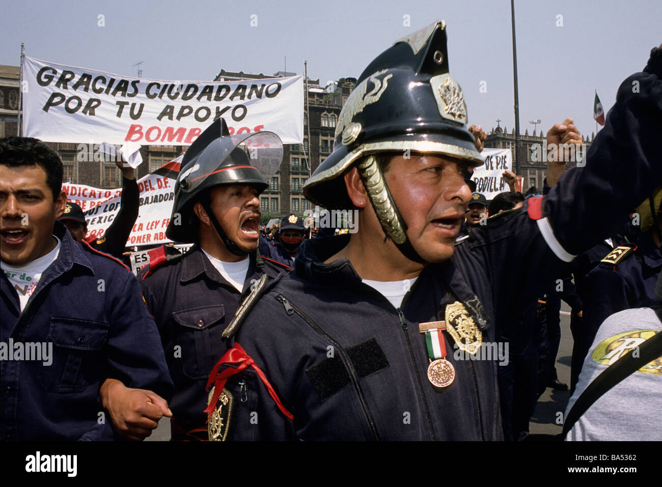 Fireman marching in the Zocalo during a labor day (May 1st) rally in ...