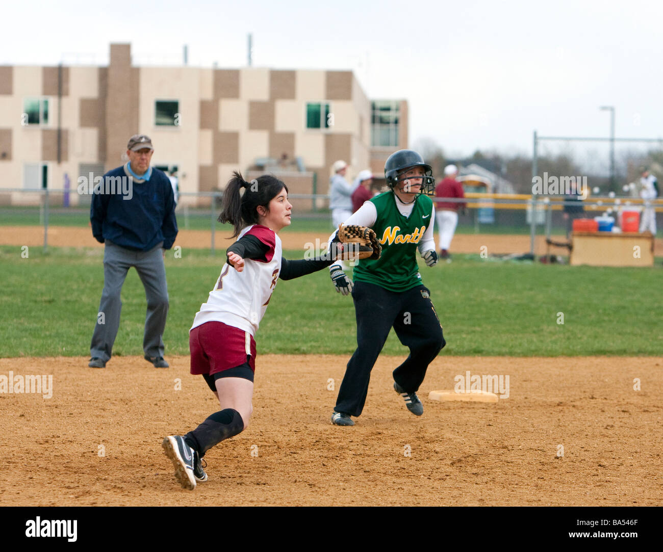 A girls high school softball game Stock Photo - Alamy