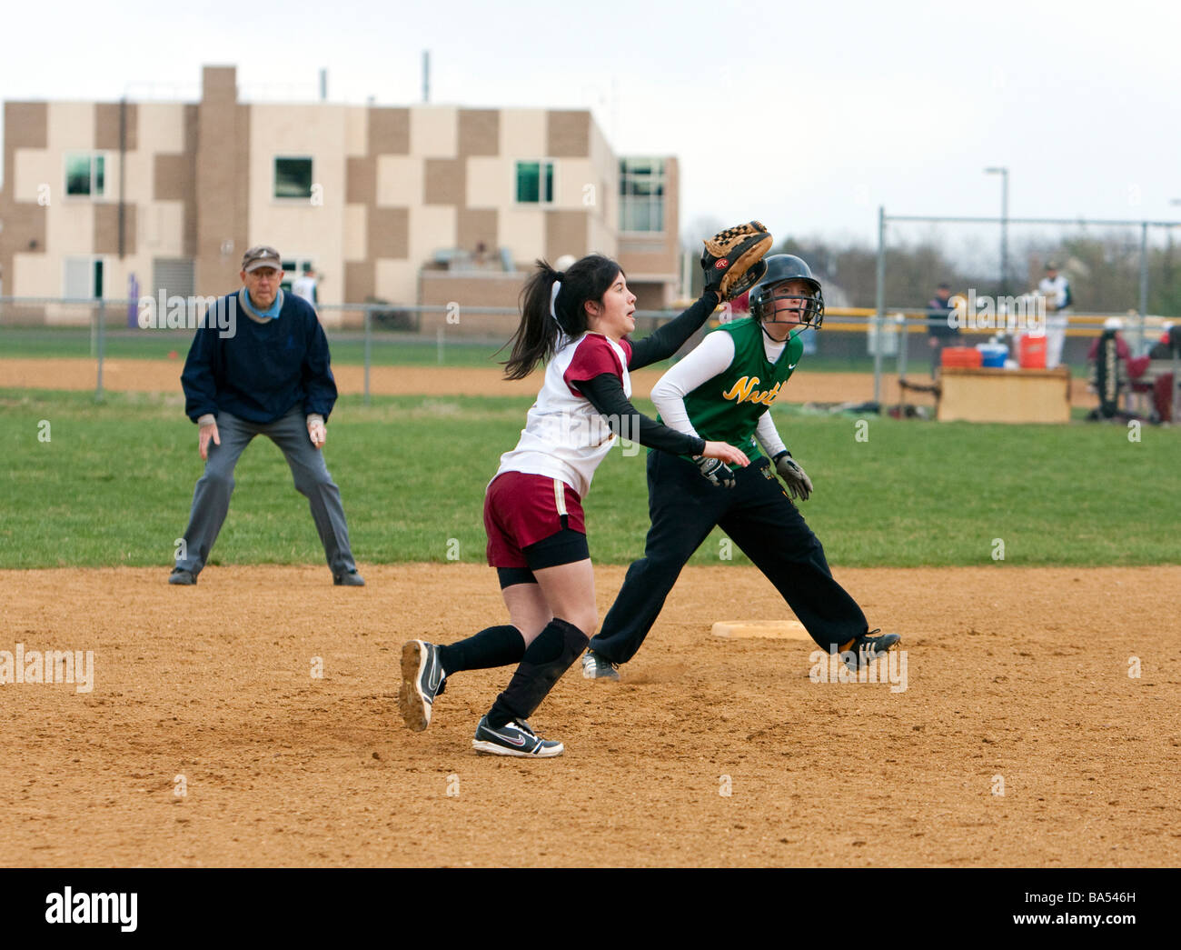 A girls high school softball game Stock Photo - Alamy