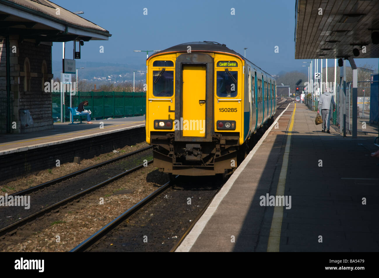 train arriving at small station Stock Photo - Alamy