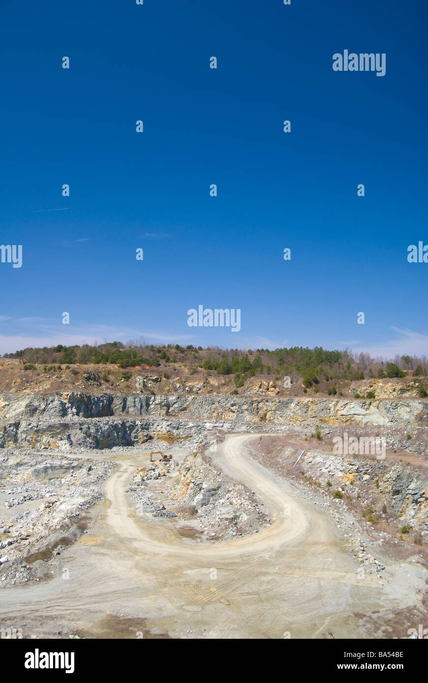 Winding road inside a quarry Stock Photo - Alamy
