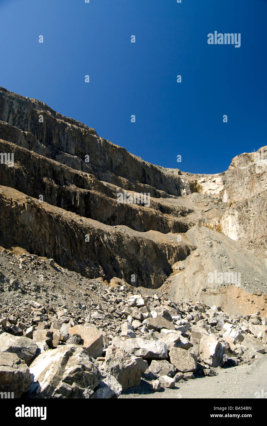 quarry wall and terraced levels and ledges Stock Photo - Alamy