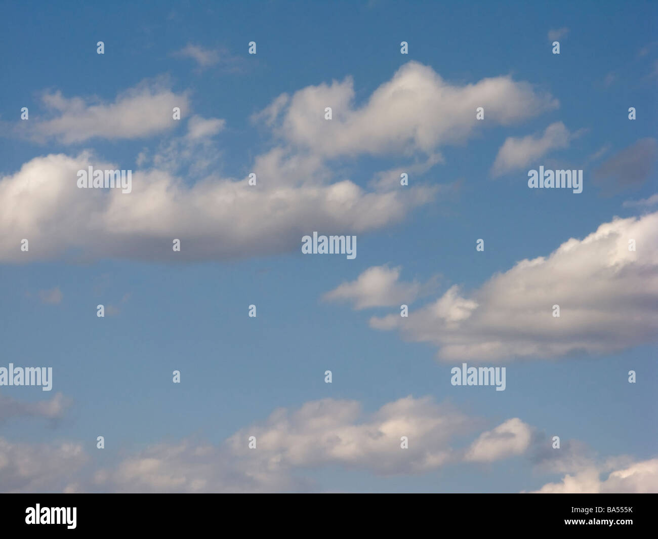 Puffy white clouds in azure sky hi-res stock photography and images - Alamy