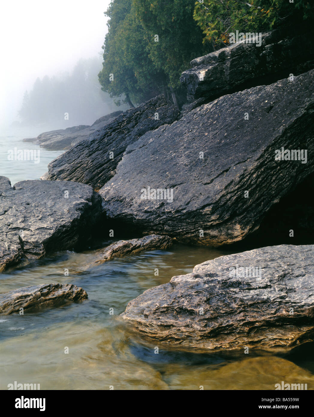 rocky shore along Newport Bay, Lake Michigan, Newport State Park, Door ...