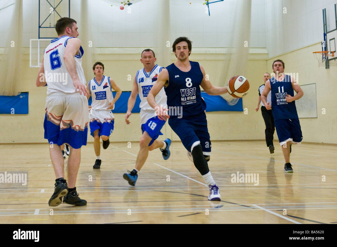 Indoor mens basketball match Stock Photo - Alamy