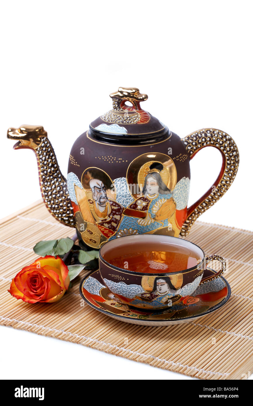 Tea set, Tea Cup with Teapot and Rose Stock Photo - Alamy