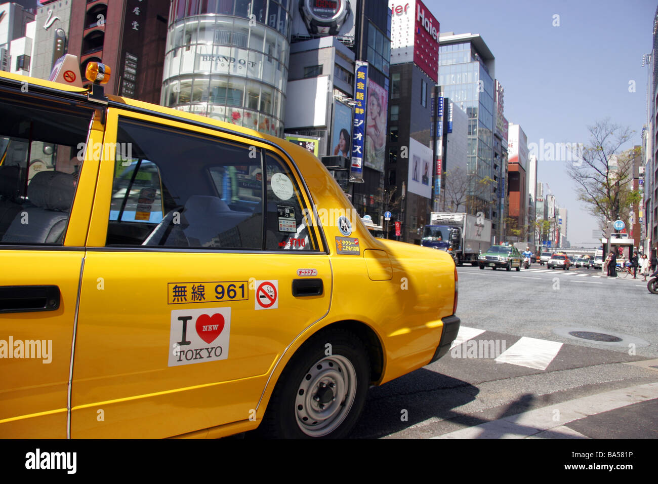 Yellow taxi cab in Ginza Tokyo Japan Stock Photo - Alamy