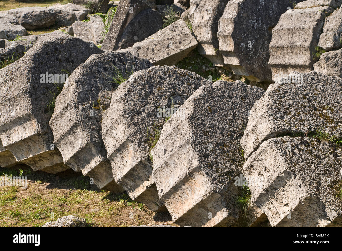 Fallen column drums at the Temple of Zeus at ancient Olympia ...