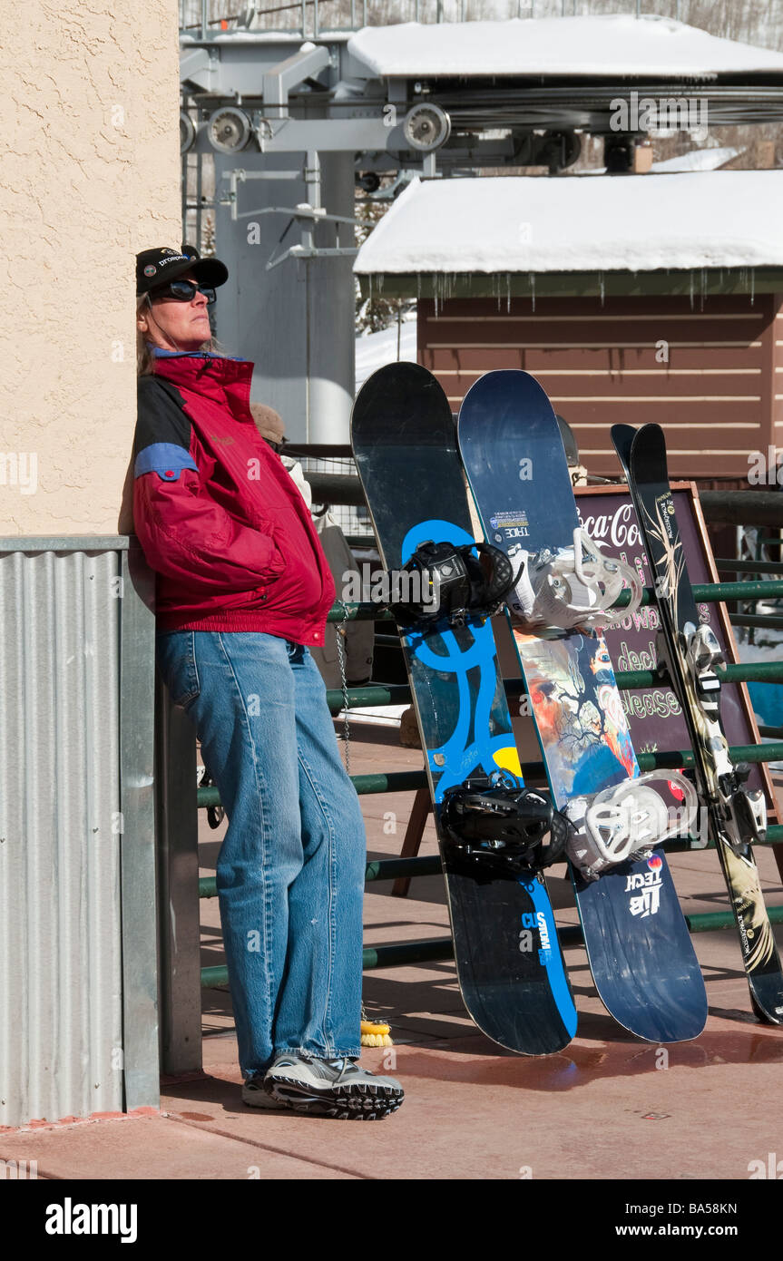 Woman holds up a wall Snowmass Village Mall, Snowmass Village, Colorado ...