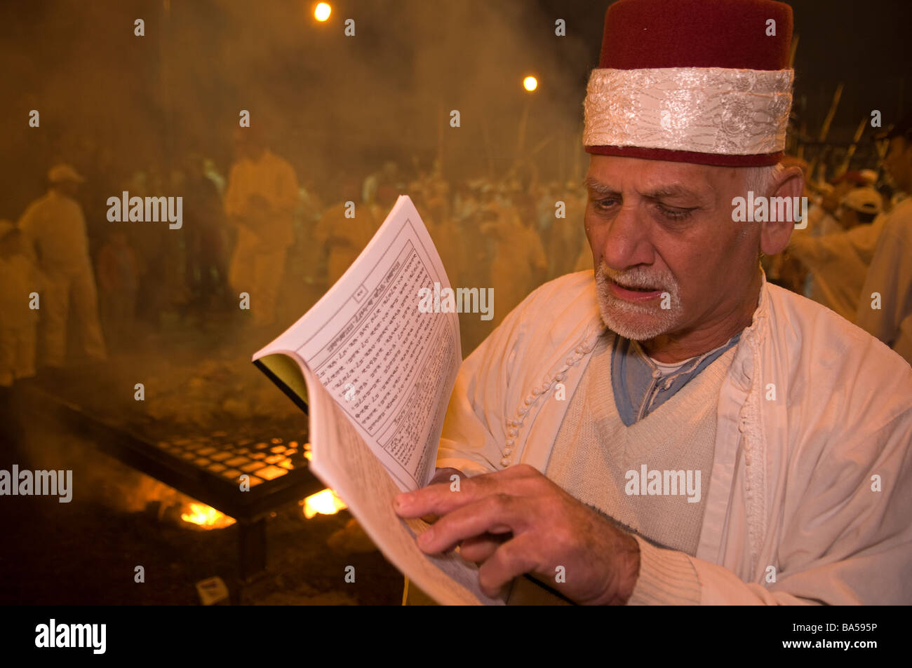 A member of the ancient Samaritan community pray during the traditional ...