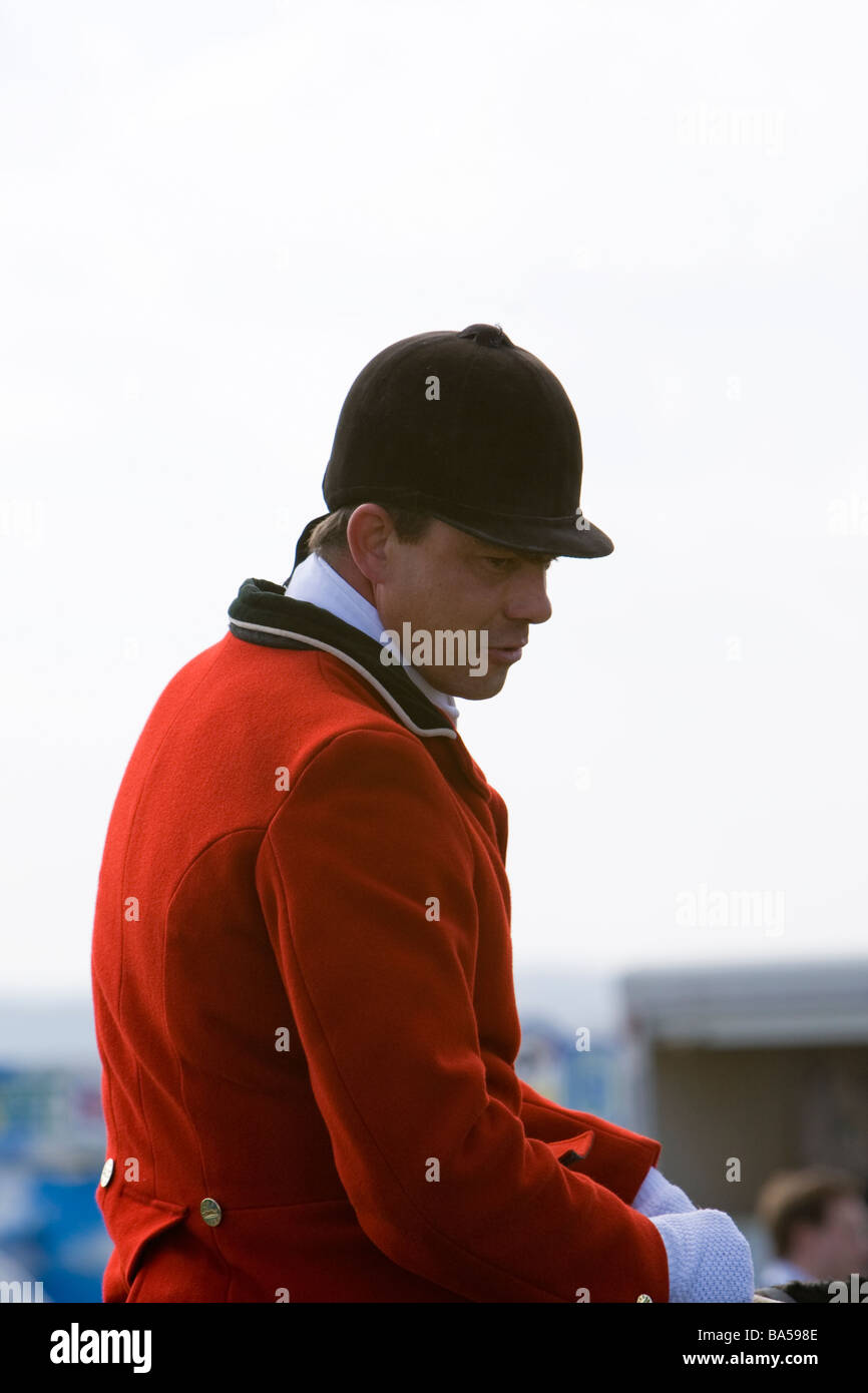 Huntsman in red coat Stock Photo - Alamy