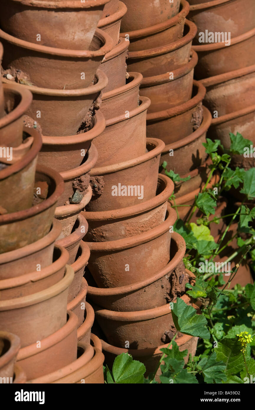 Stacked clay flower pots Stock Photo - Alamy