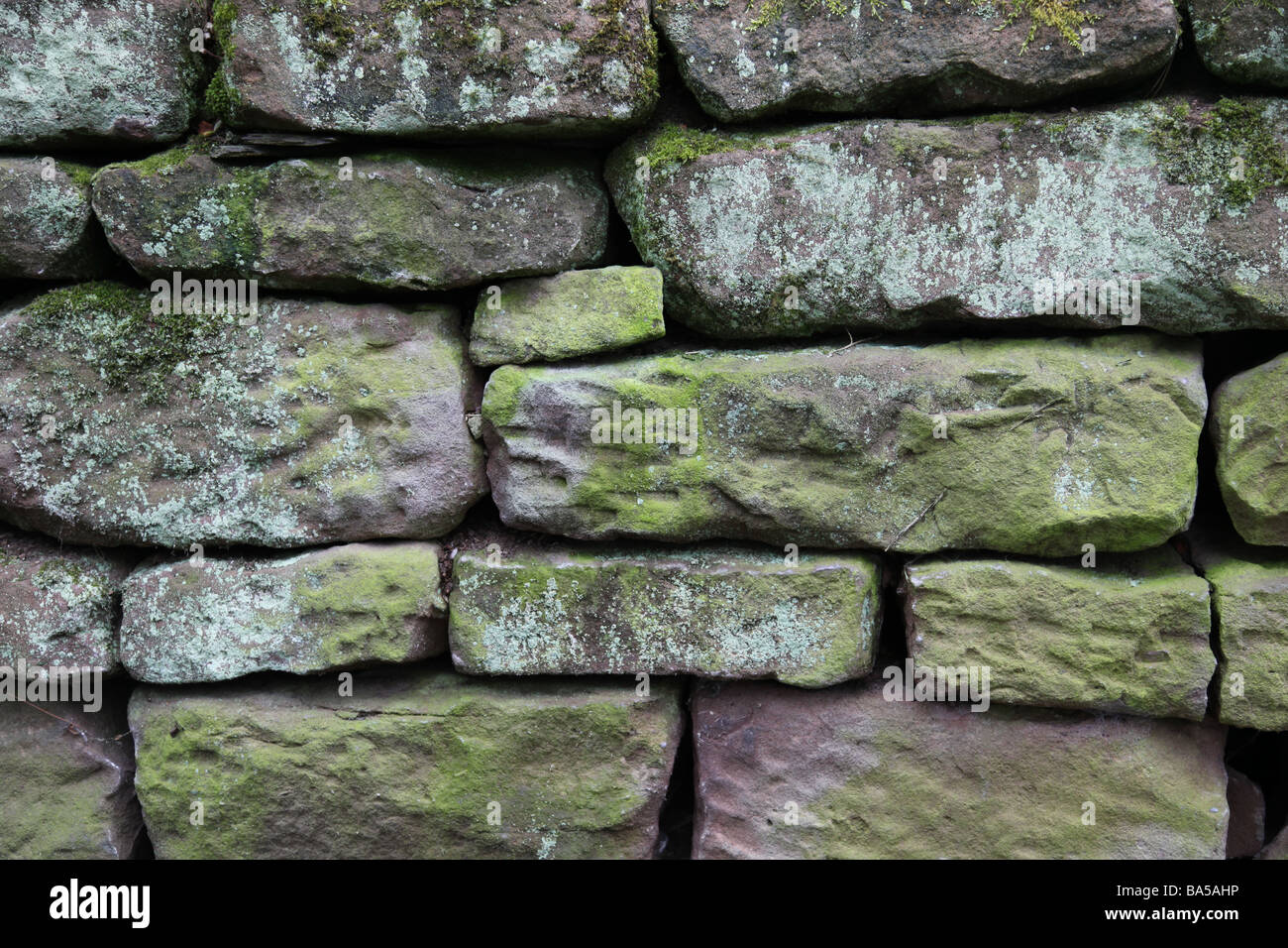Dry sandstone stone wall Stock Photo - Alamy