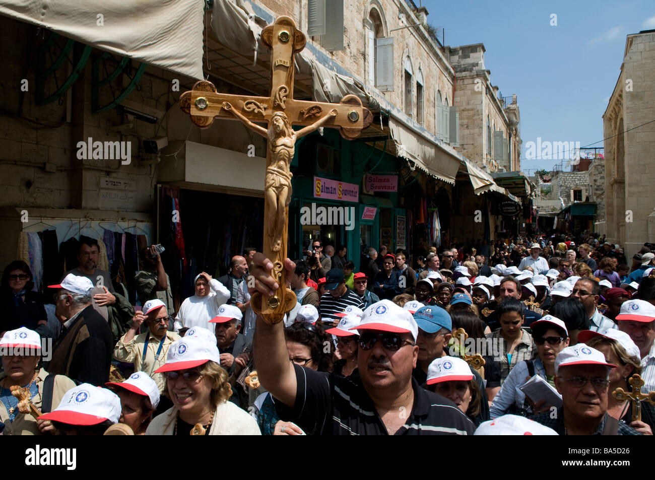 Christian pilgrims walking along Via Dolorosa during a Good Friday ...
