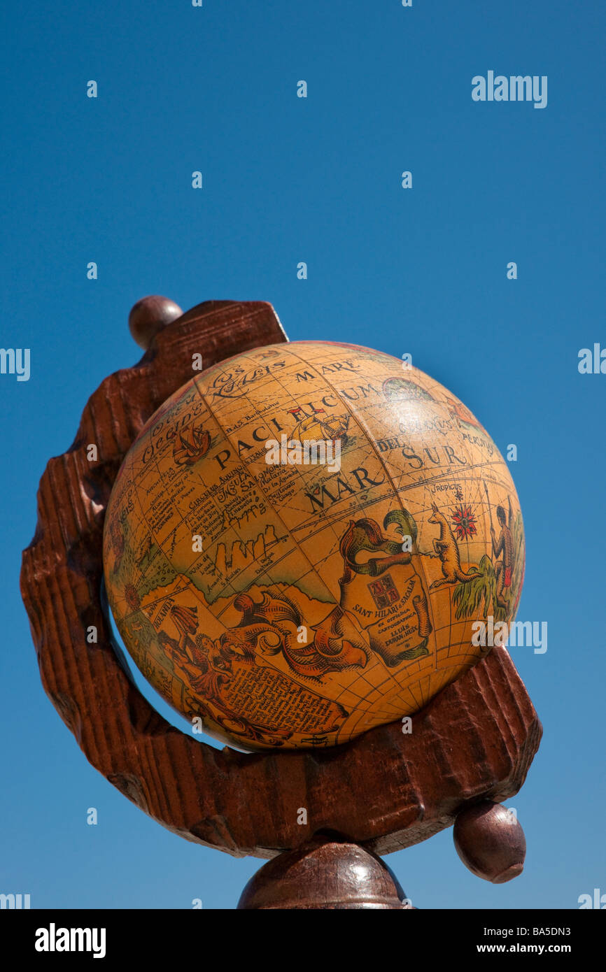 Antique globe map against clear blue sky Stock Photo - Alamy