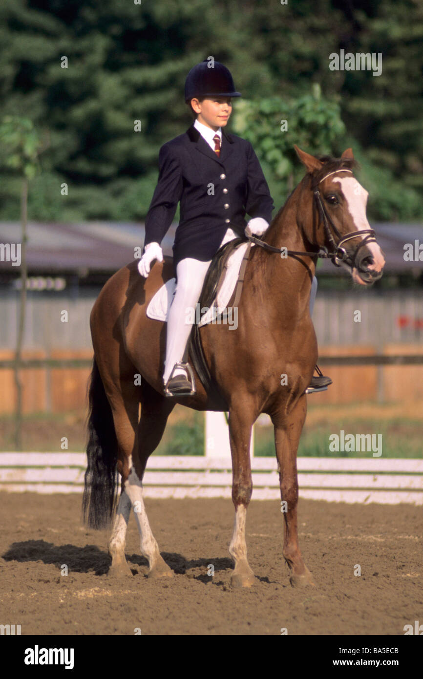 Horses jumping girls hi-res stock photography and images - Alamy