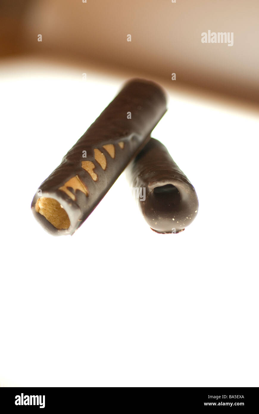 two chocolate stick biscuits Stock Photo - Alamy